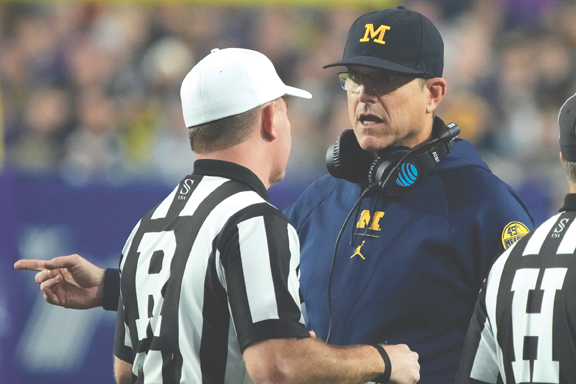 NCAA looks into potential football infractions with Michigan Wolverines ...